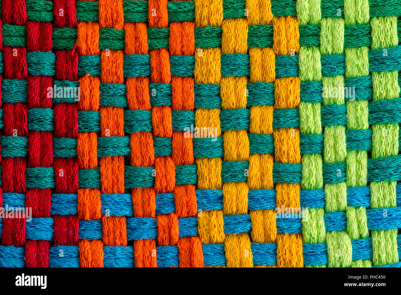 Background made up of multicolored interweaving vertical and blue ...