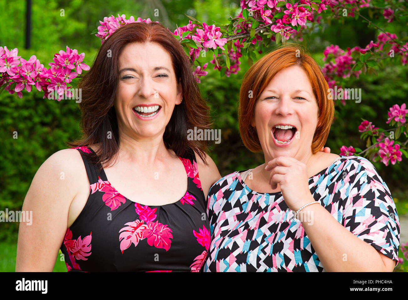 Young adult couple laughing with friend hi-res stock photography and ...