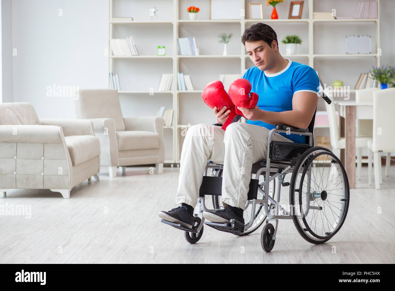 Wheelchair and boxing gloves hi-res stock photography and images - Alamy