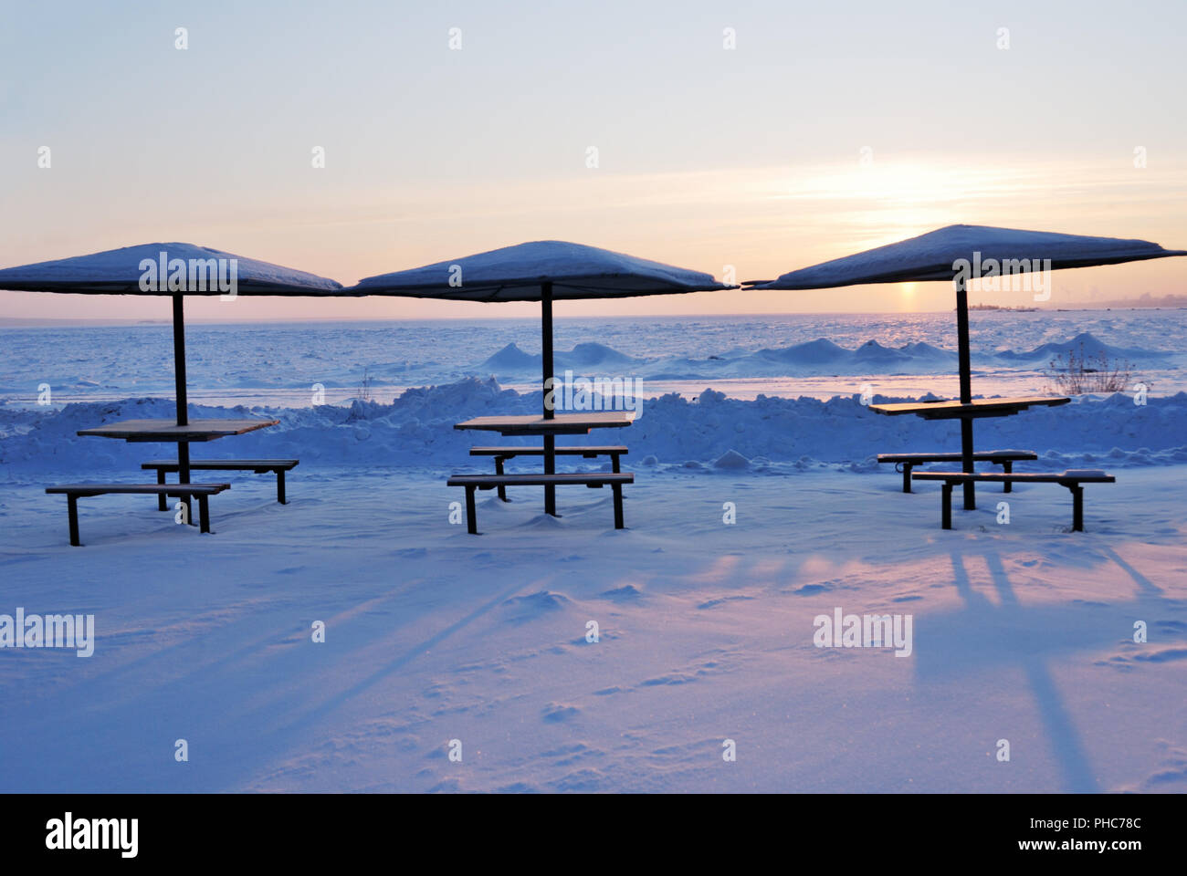 beautiful beach in the winter snow Stock Photo - Alamy
