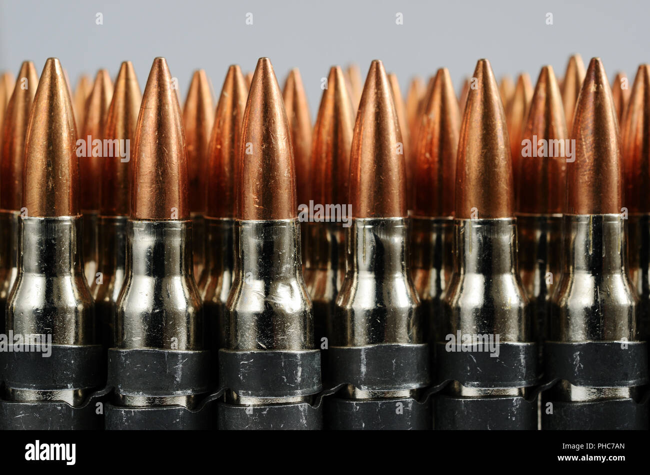 chain of bullets over white, horizontal Stock Photo - Alamy