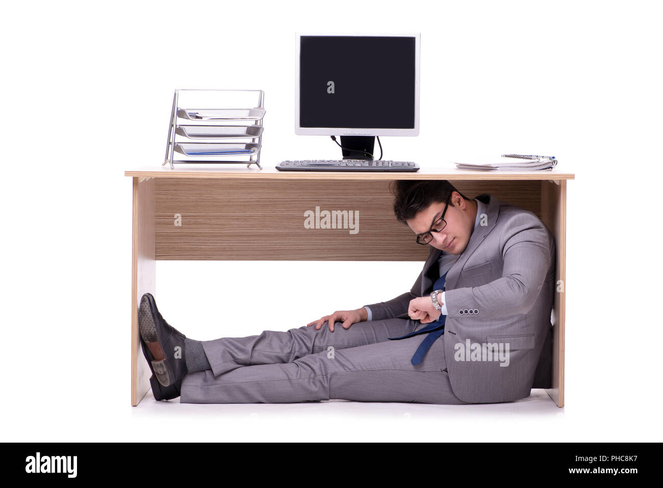 The businessman hiding in the ofice Stock Photo - Alamy