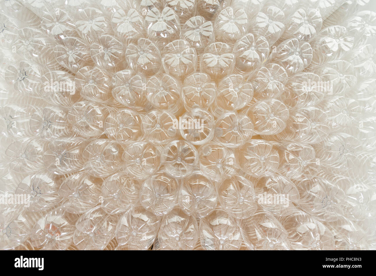 Background texture of upturned empty clean plastic pet bottles viewed ...