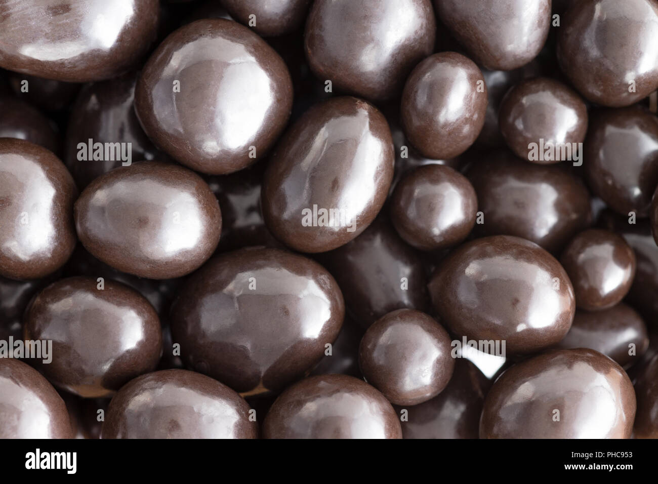 Macro full frame background texture of milk chocolate ball candies for ...