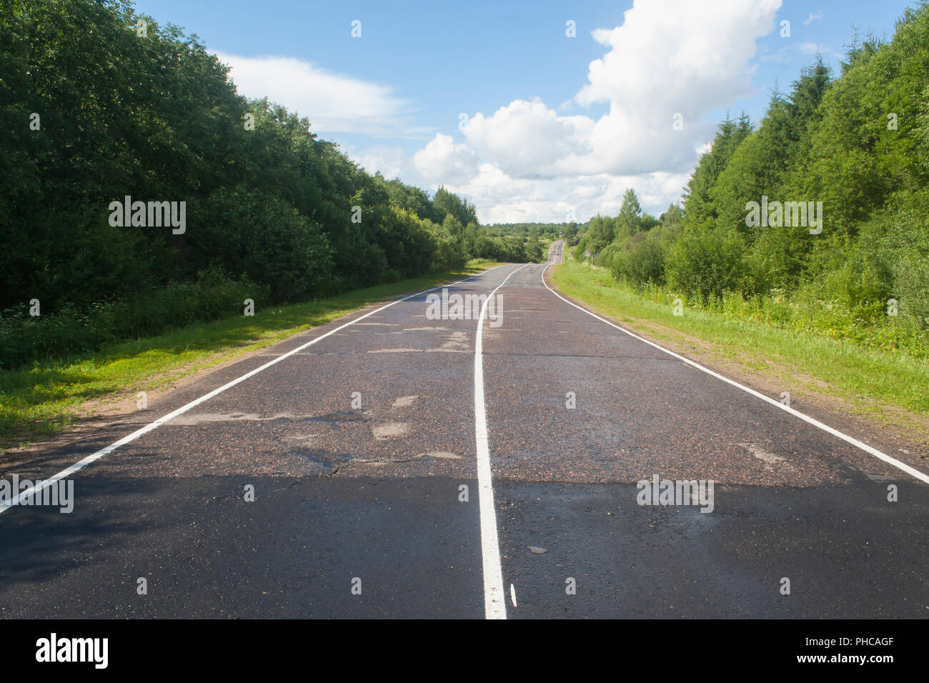 asphalt road in a hilly area Stock Photo - Alamy
