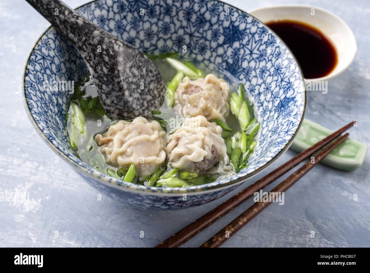 Traditional Chinese Wan Tan Soup as close-up in a bowl Stock Photo - Alamy