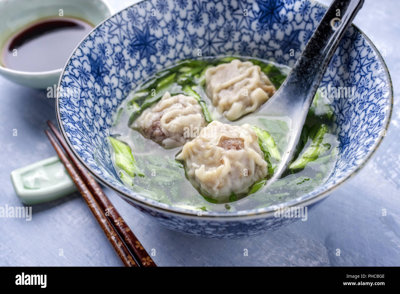 Traditional Chinese Wan Tan Soup as close-up in a bowl Stock Photo - Alamy