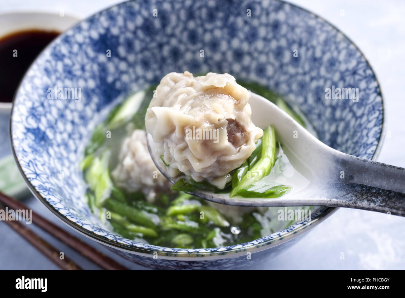 Traditional Chinese Wan Tan Soup as close-up in a bowl Stock Photo - Alamy