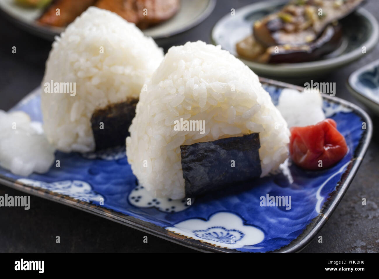 Traditional Japanese Onigiri with Umeboshi as garnish on a bowl Stock ...