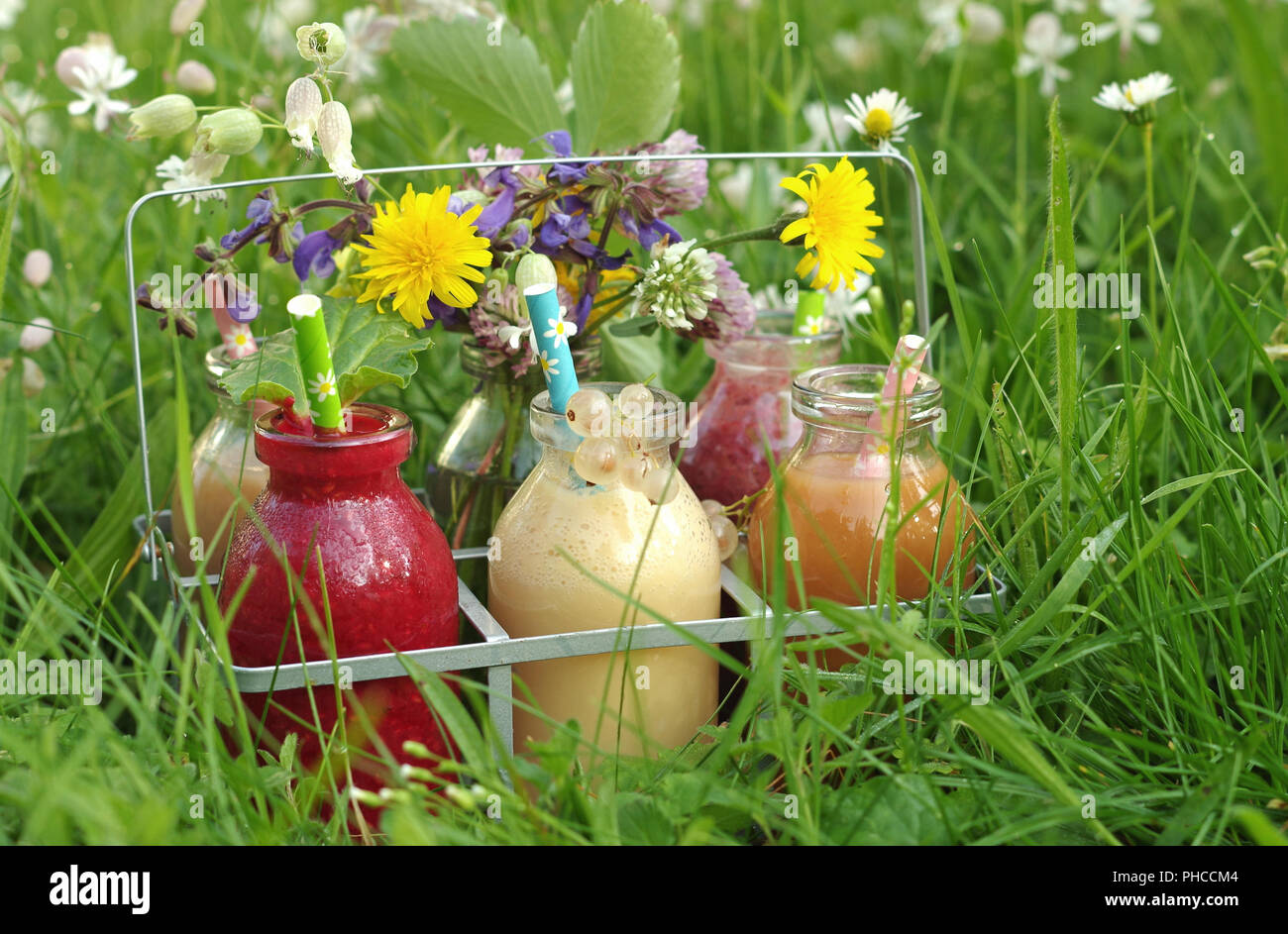 various fruit smoothies in flask Stock Photo - Alamy