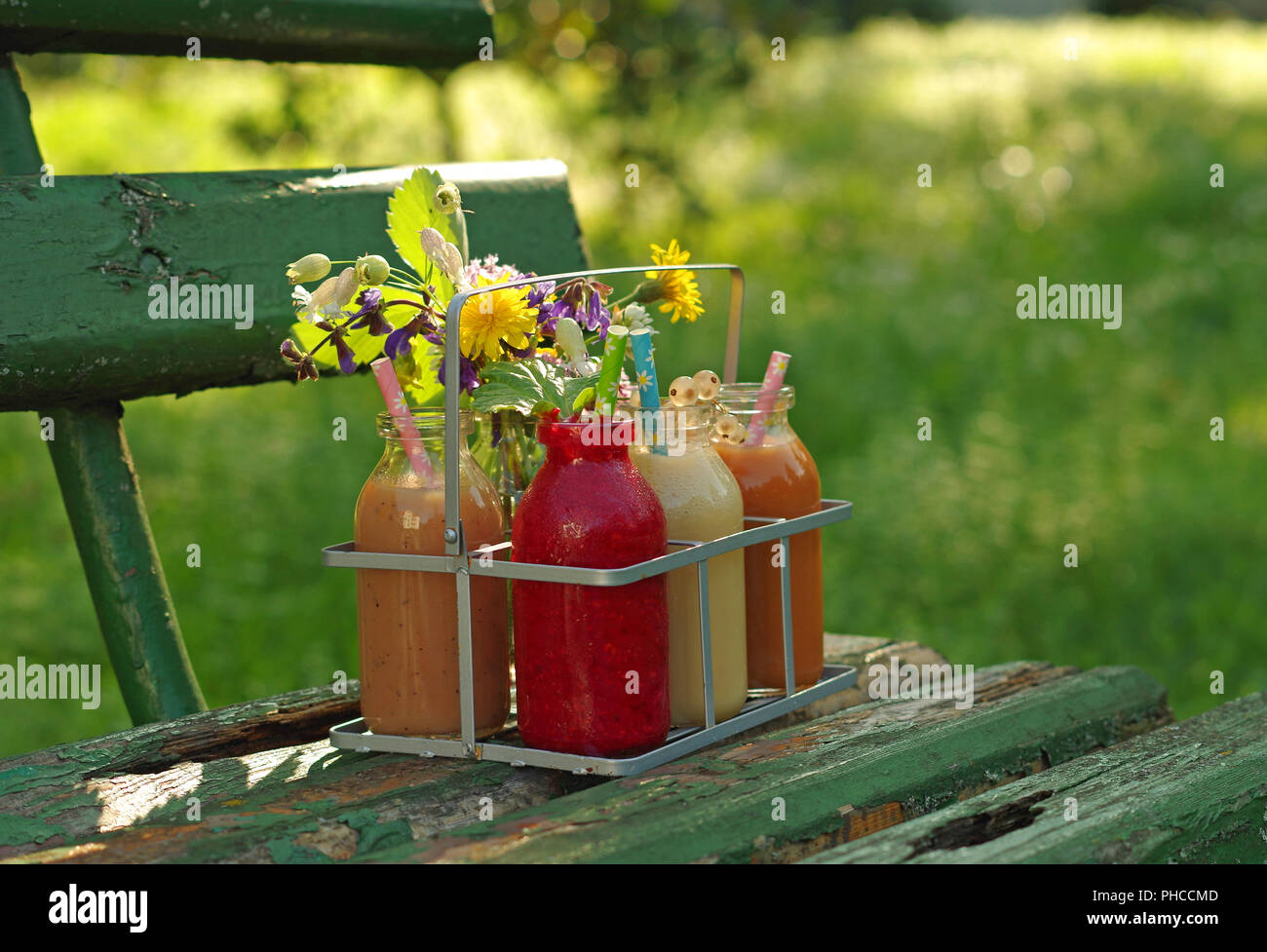 various fruit smoothies in flask Stock Photo - Alamy