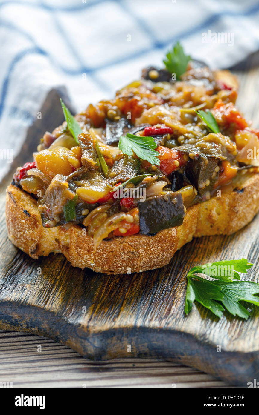 Delicious crostini with roasted vegetables Stock Photo - Alamy