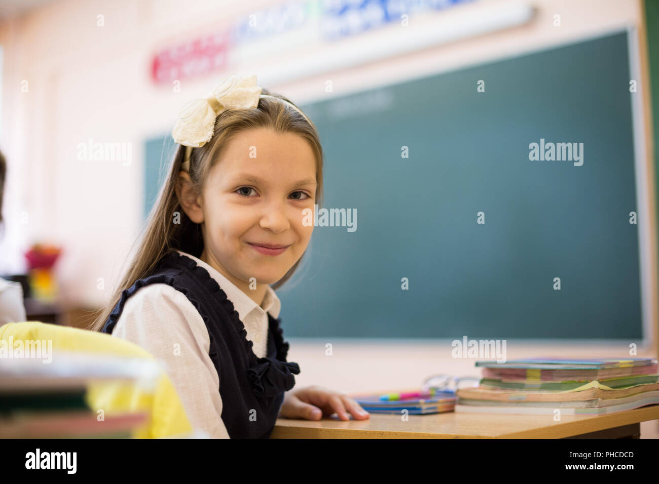 Schoolgirl classroom hi-res stock photography and images - Alamy