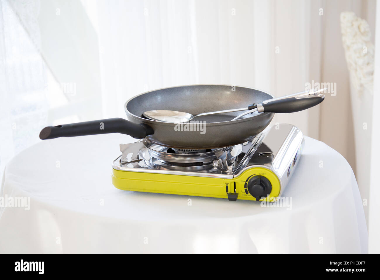 Portable gas stove on the table Stock Photo - Alamy