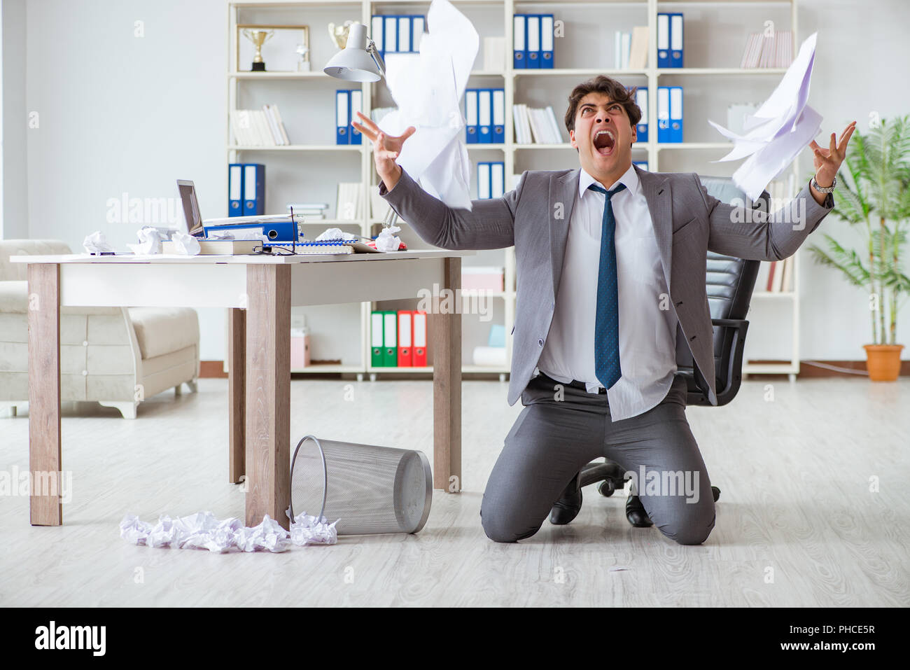 Angry businessman shocked working in the office fired sacked Stock ...