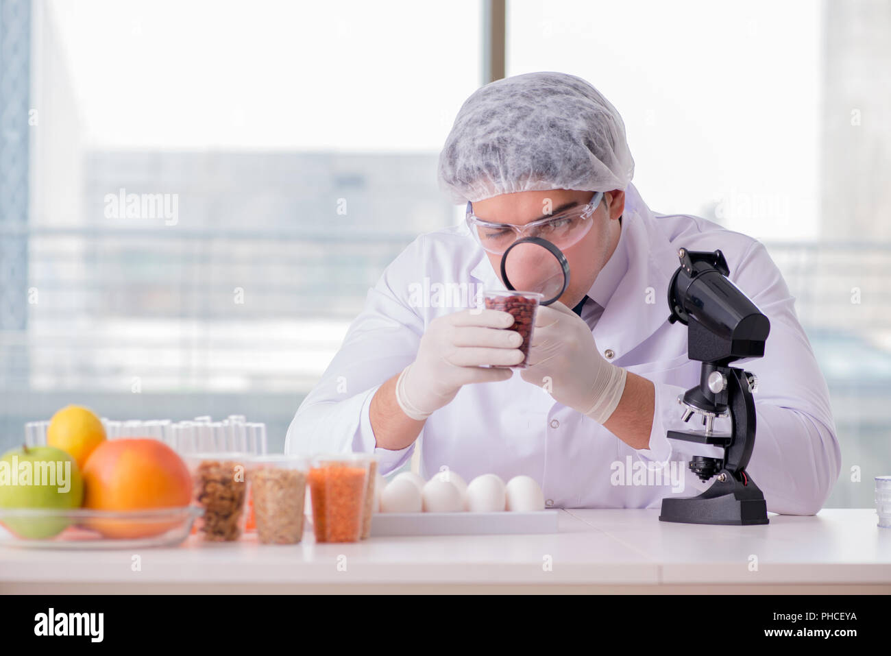Nutrition expert testing food products in lab Stock Photo - Alamy
