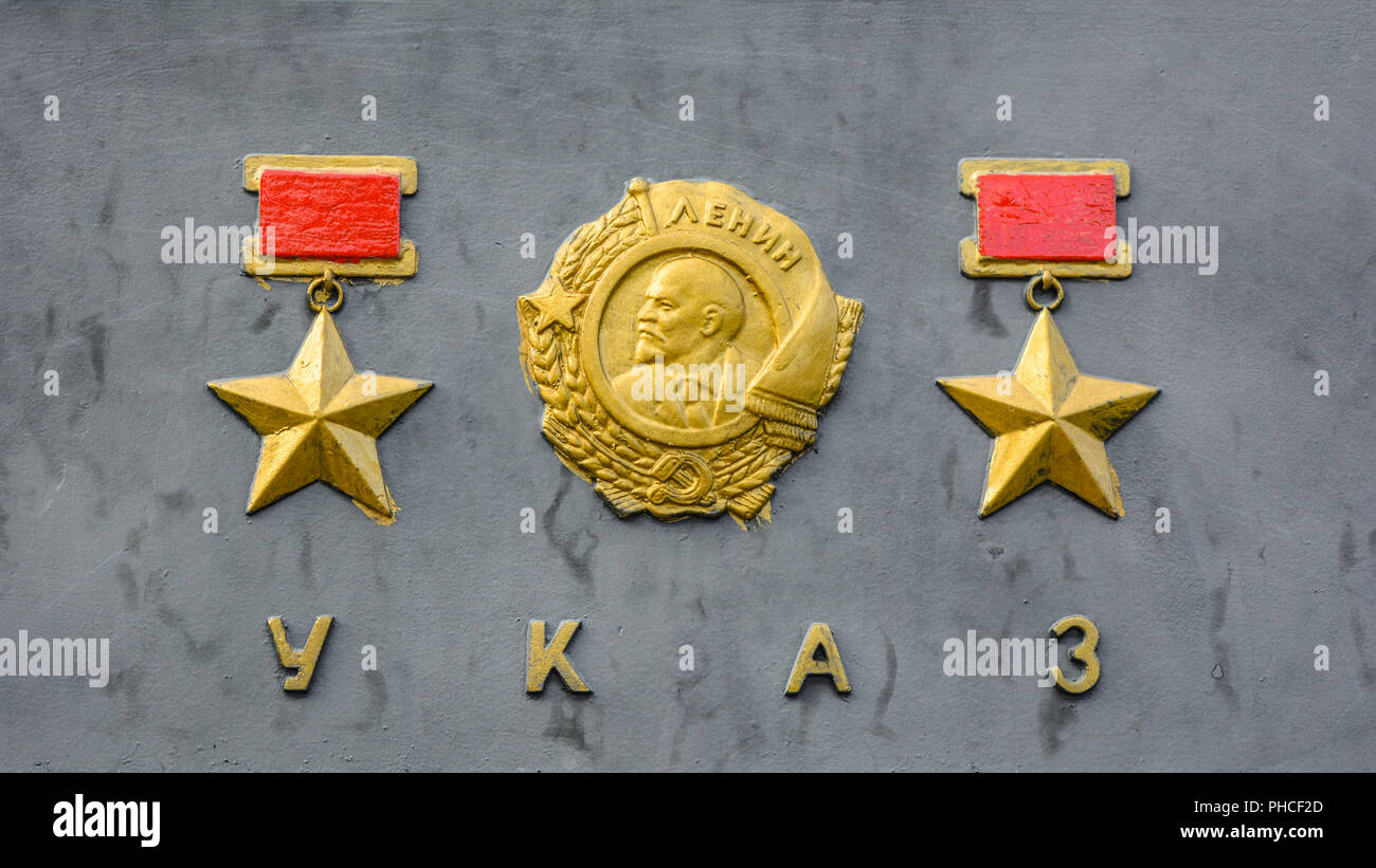 Signs of Order Hero of Soviet Union Gold Star and emblem with portrait ...