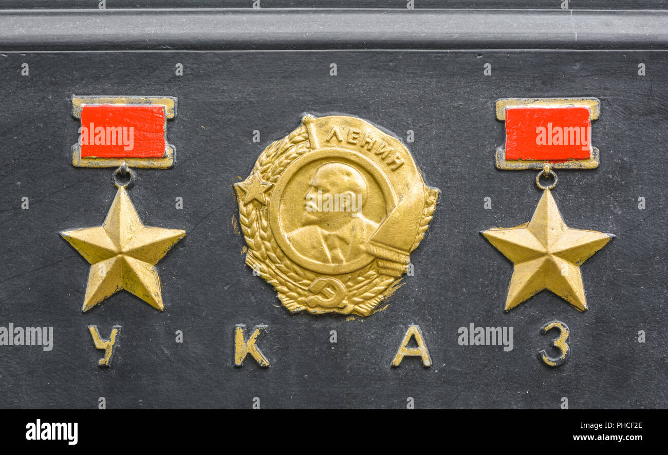 Signs of Order Hero of Soviet Union Gold Star and emblem with portrait ...