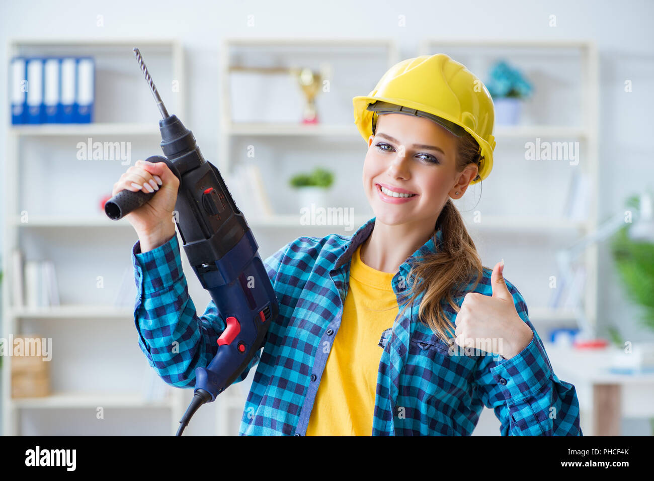Woman toolbox at home drill hi-res stock photography and images - Alamy
