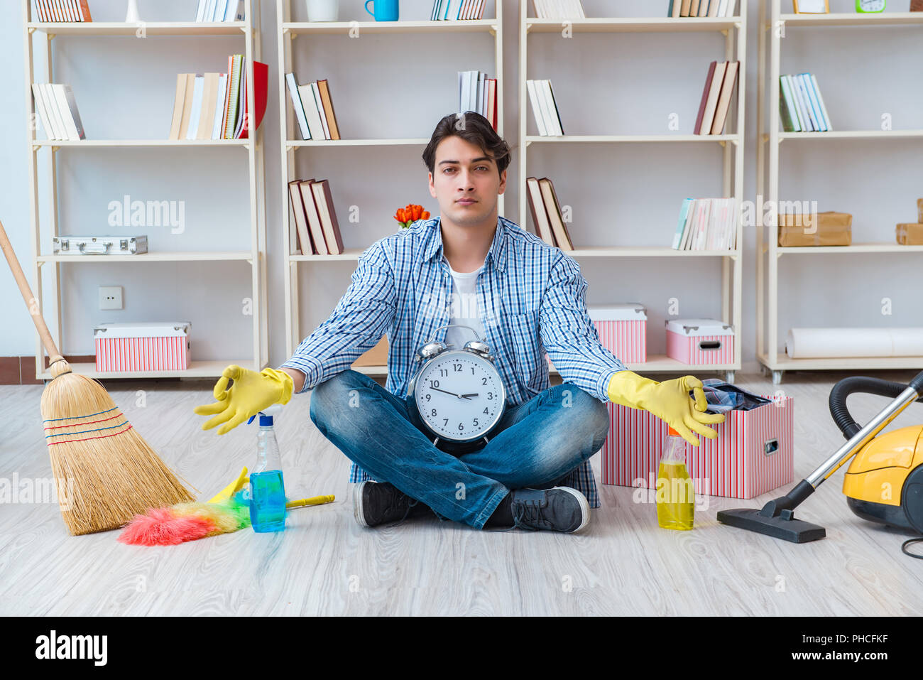 Man cleaning clock hi-res stock photography and images - Alamy