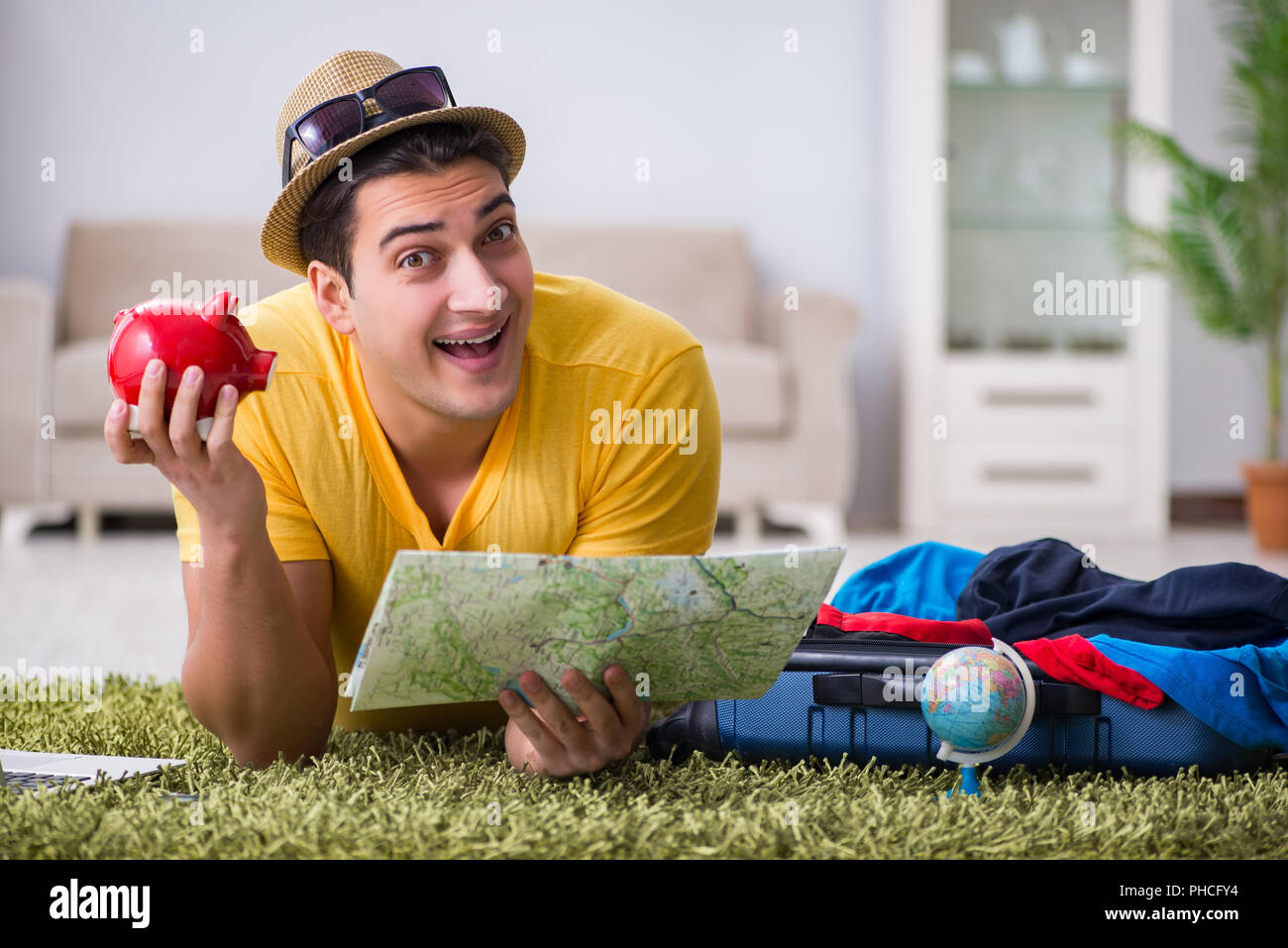 Man planning his vacation trip with map Stock Photo - Alamy