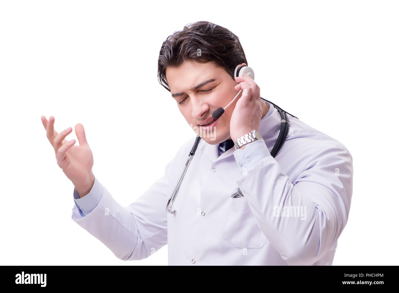 The young doctor with phone headset isolated on white Stock Photo - Alamy