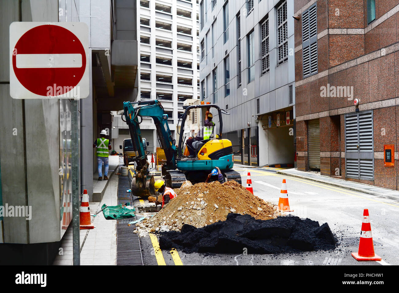 Fixing road asphalt excavator hi-res stock photography and images - Alamy