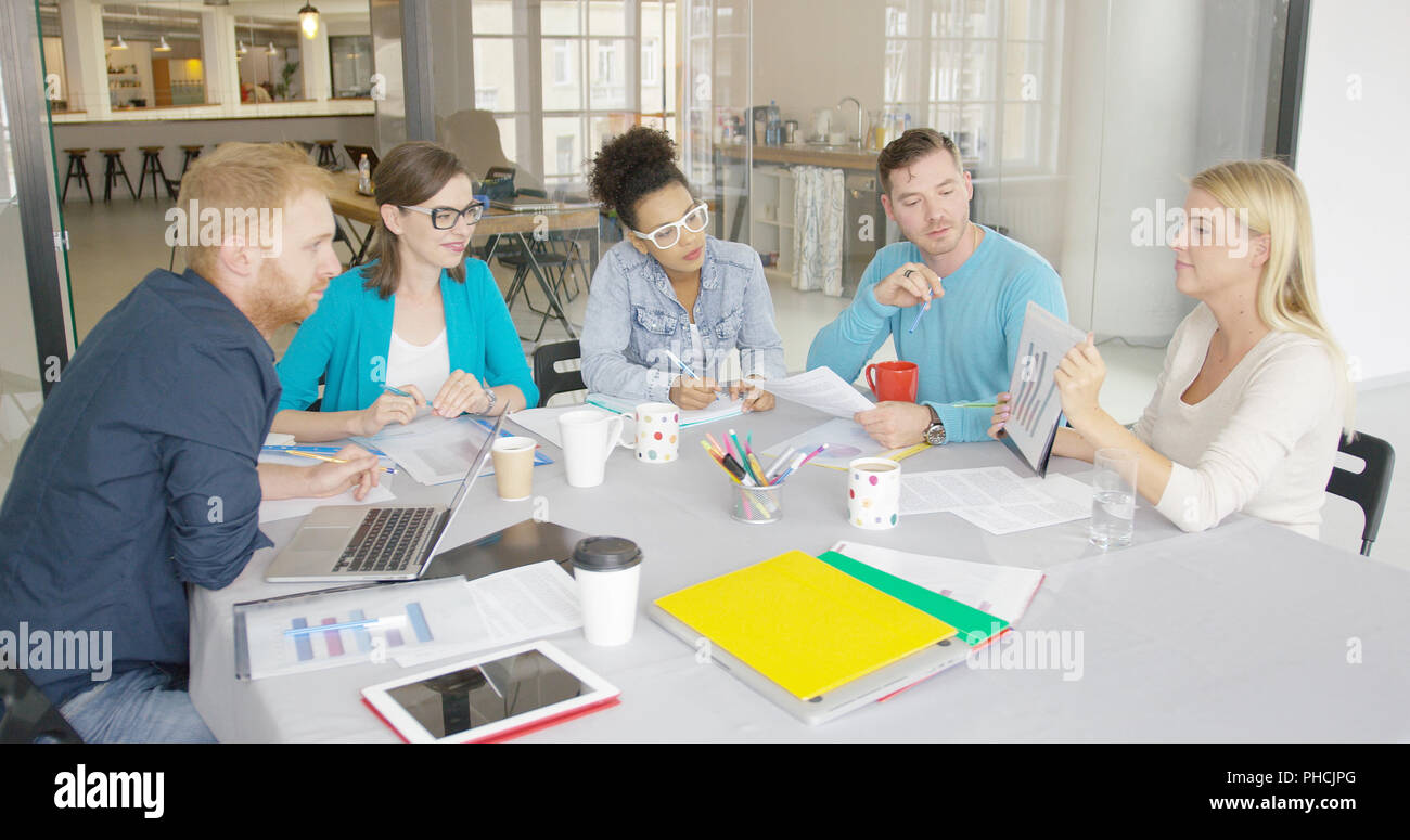 People watching graphics and statistics Stock Photo - Alamy