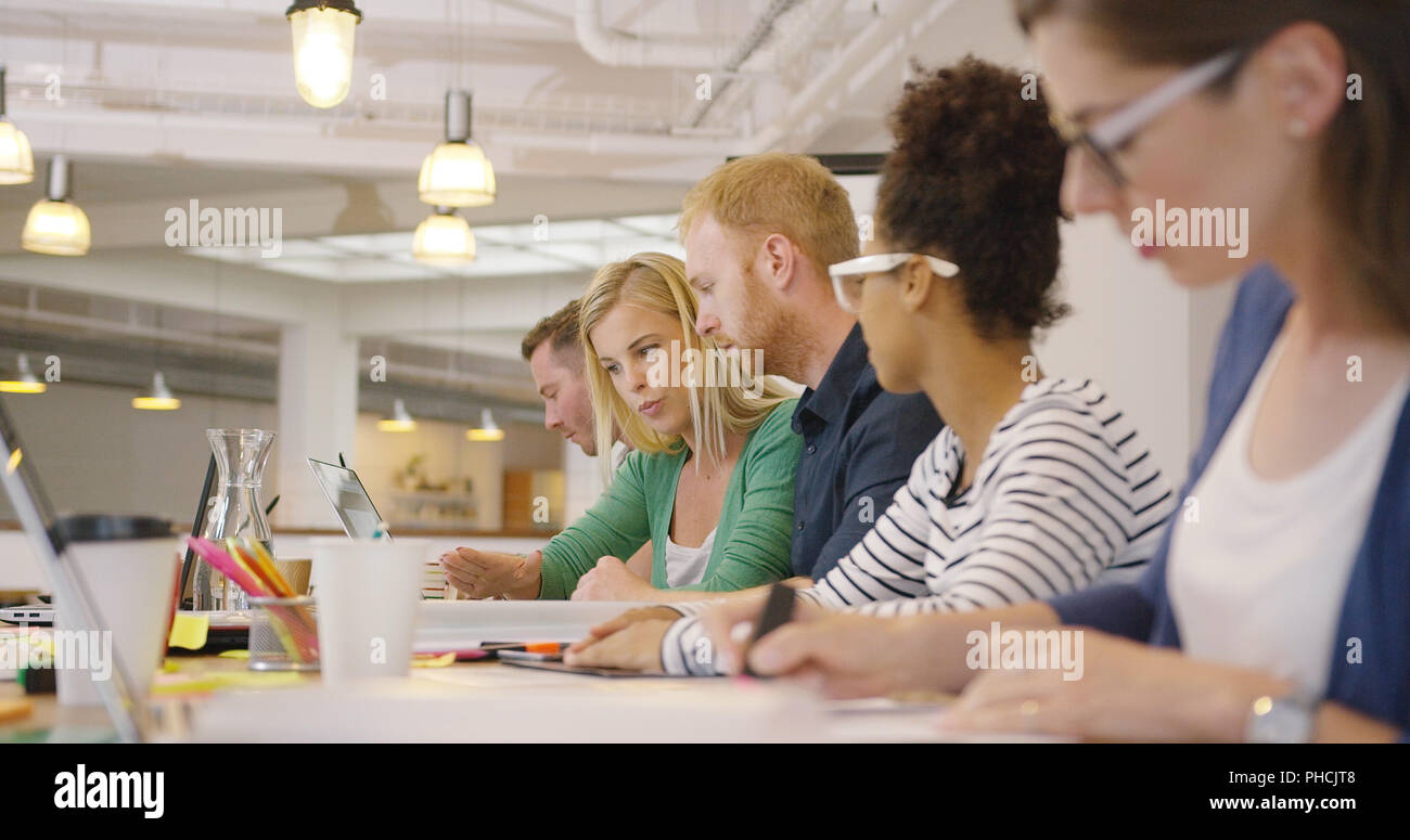 Employees working in office space hi-res stock photography and images ...