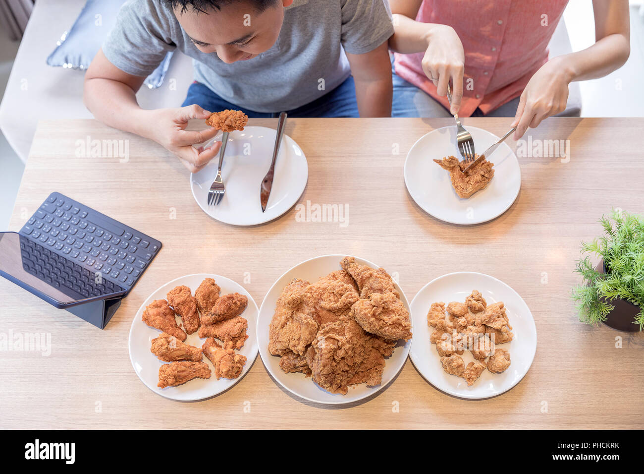 Couples eating together Stock Photo - Alamy