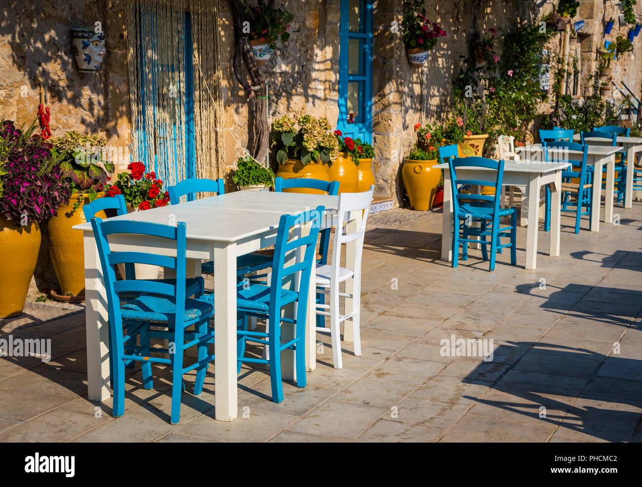 Tables in a traditional Italian Restaurant in Sicily Stock Photo - Alamy