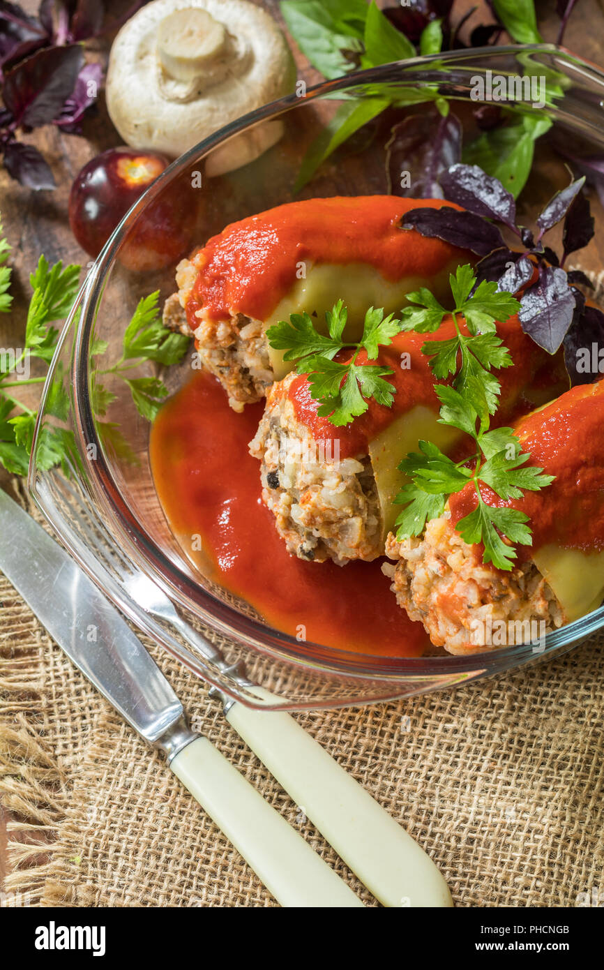 Cooked stuffed pepper served in a transparent glass pot Stock Photo - Alamy