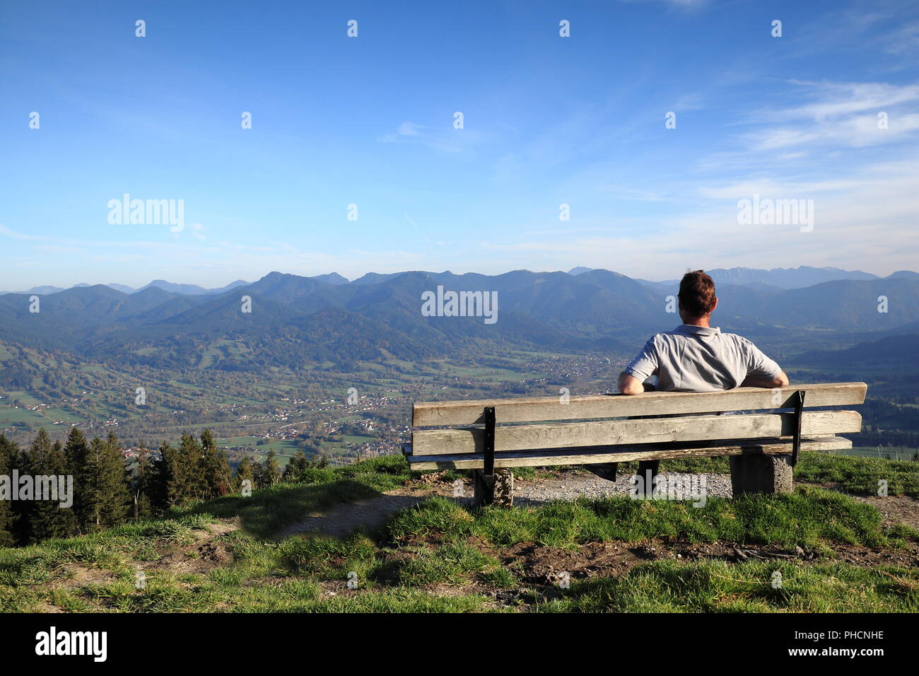Man sitting bench rear view hi-res stock photography and images - Alamy