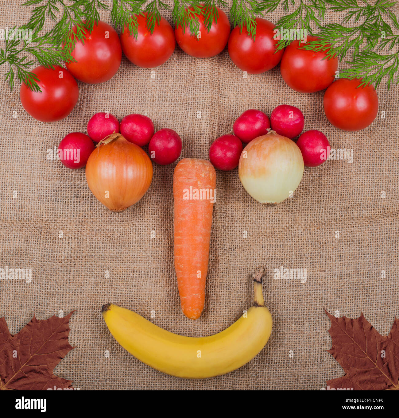Vegetable face photographed on a Jute fabric a vegetable market Stock ...
