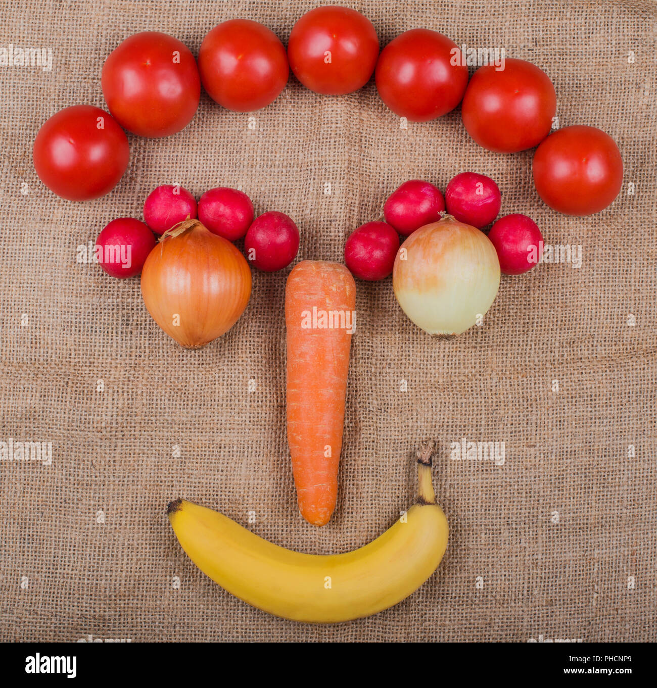Vegetable face photographed on a Jute fabric a vegetable market Stock ...