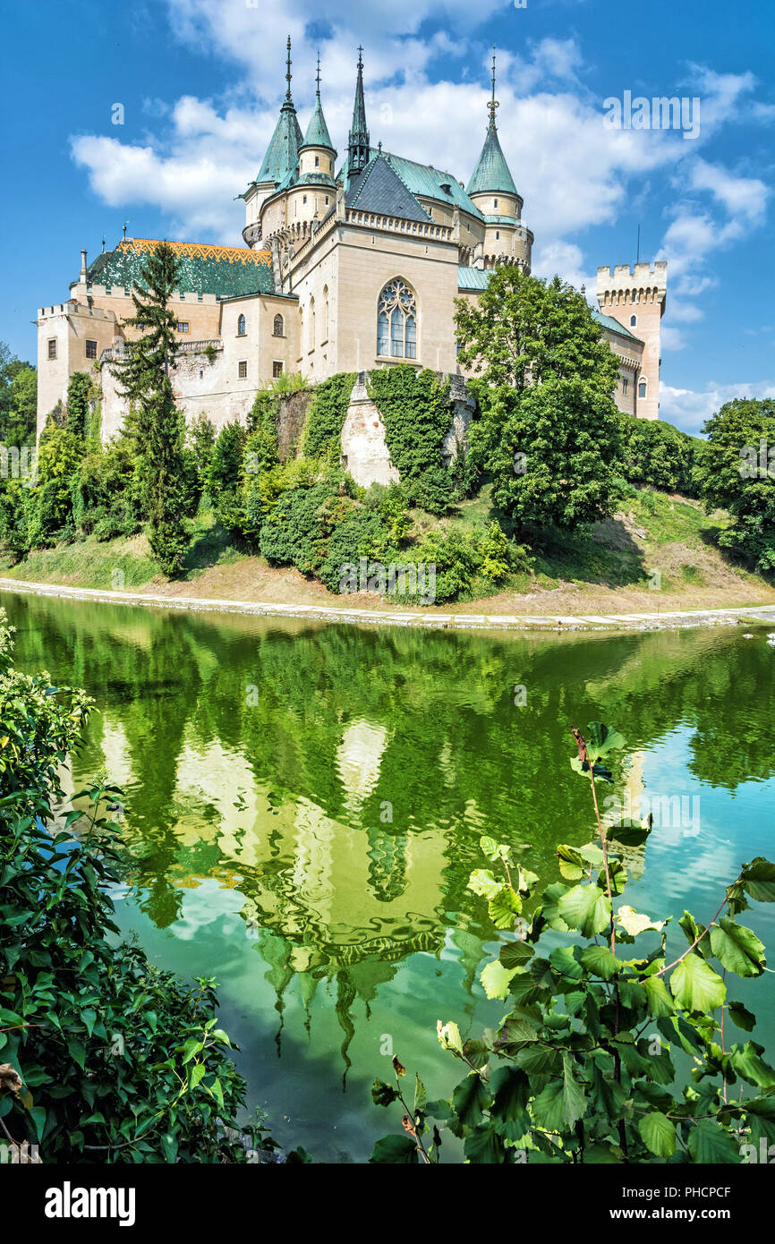 Bojnice castle is mirrored in water, Slovak republic. Cultural heritage ...