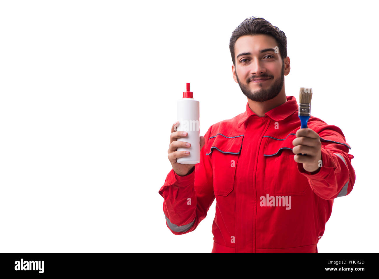 Young repairman with paint glue and a paintbrush brush isolated Stock ...