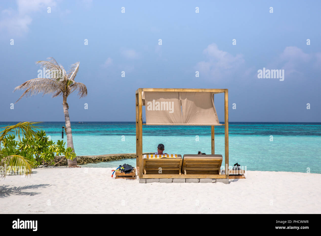 Amazing beach, yellow beach umbrella, blue sky, concept of paradise ...