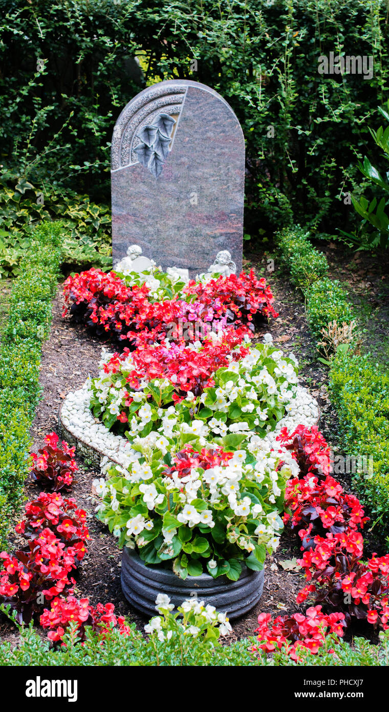 Marble tombstone and grave in an old cemetery Stock Photo - Alamy