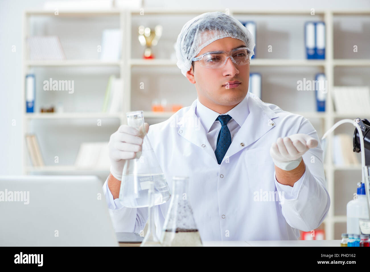 Young researcher scientist doing a water test contamination expe Stock ...