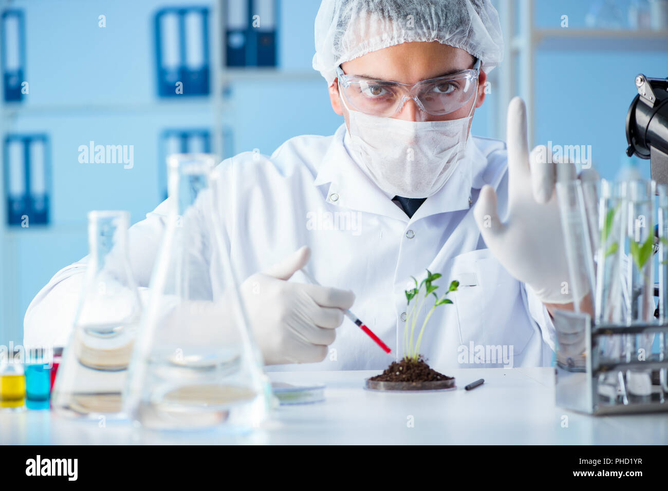 Male scientist analyzing lab environment hi-res stock photography and ...