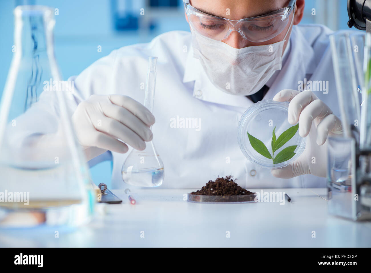 Male scientist researcher doing experiment in a laboratory Stock Photo ...