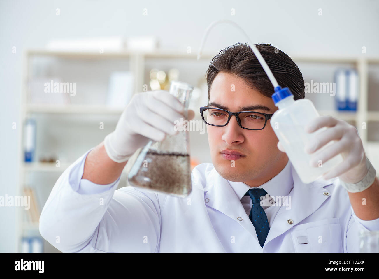 Young researcher scientist doing a water test contamination expe Stock ...