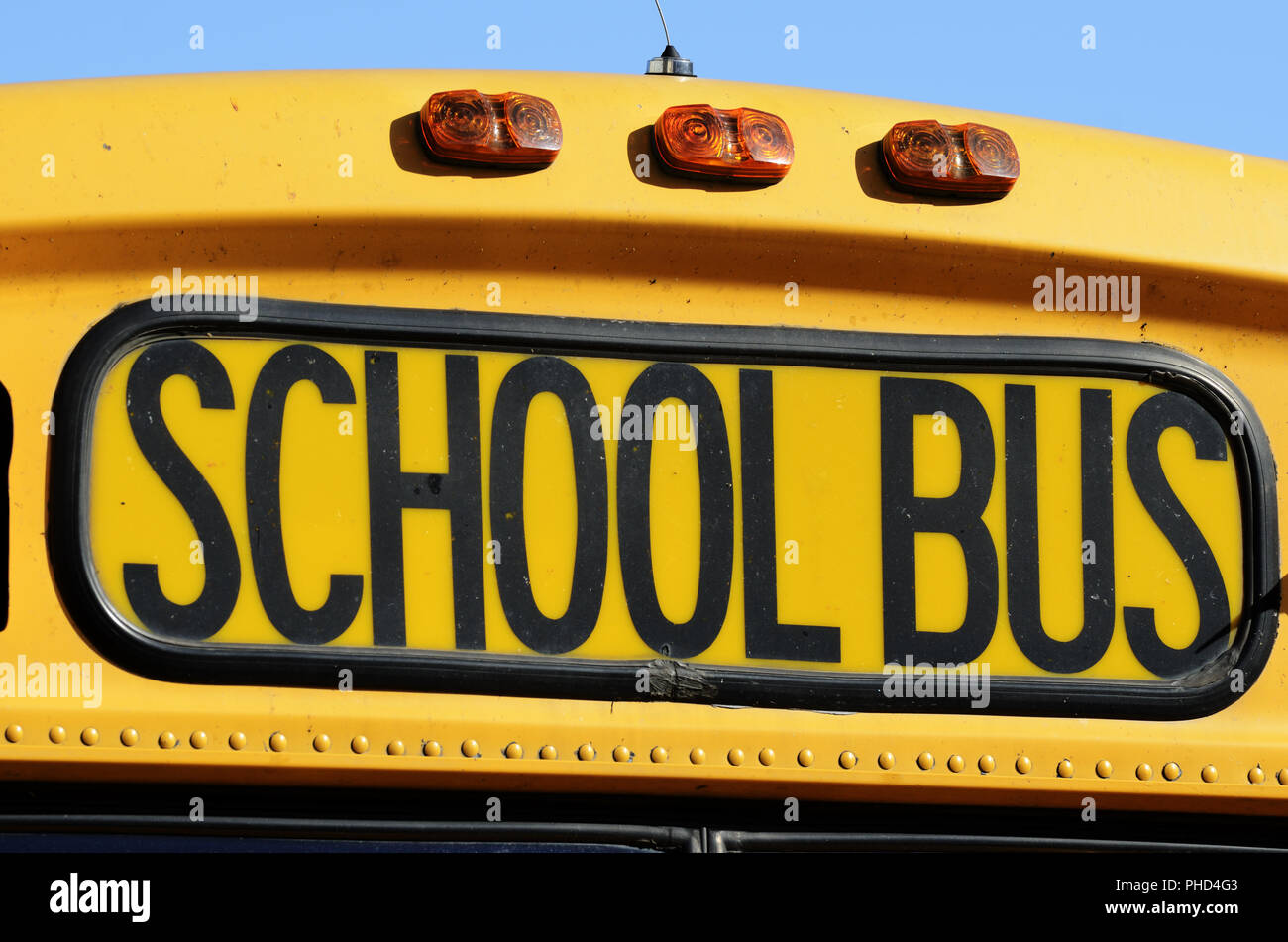 front of a yellow school bus Stock Photo - Alamy