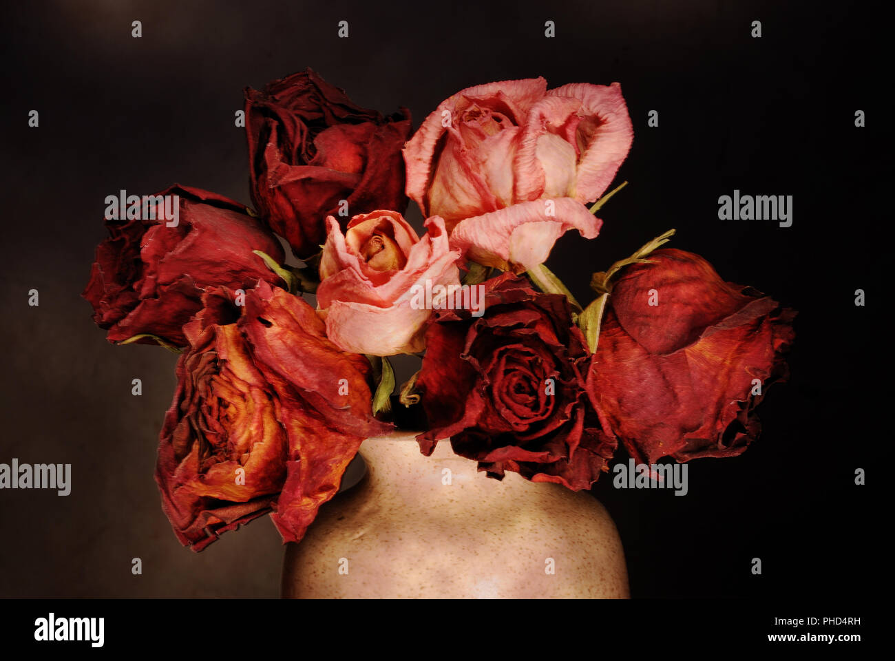bouquet of dried roses in vase with Grunge Filter Stock Photo - Alamy