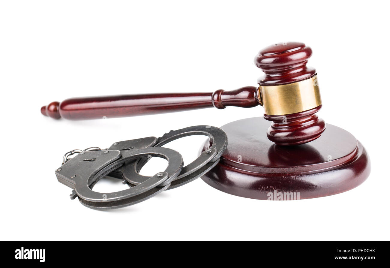 Gavel and handcuffs on white background Stock Photo - Alamy