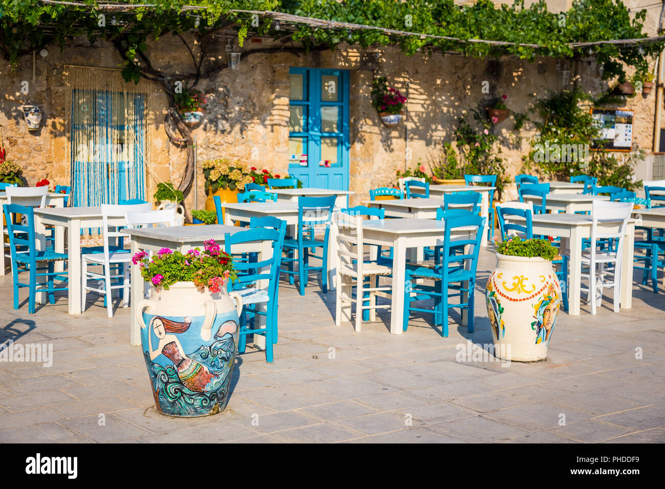 Tables in a traditional Italian Restaurant in Sicily Stock Photo - Alamy