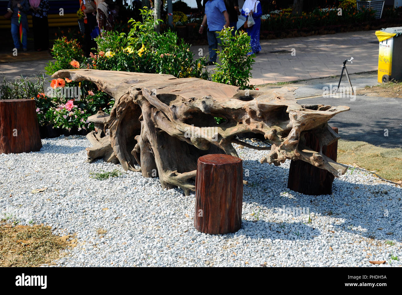 Tables and benches made of wood stumps and used wood. Designer ...