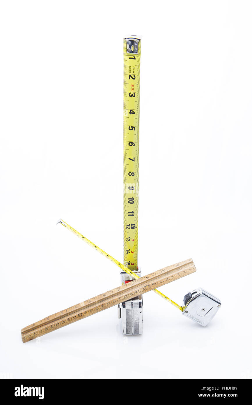 Multiple rulers on white background Stock Photo - Alamy