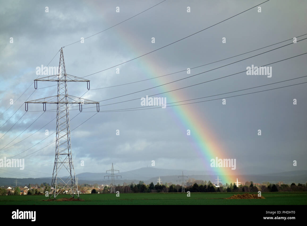 electricity network with a rainbow Stock Photo - Alamy